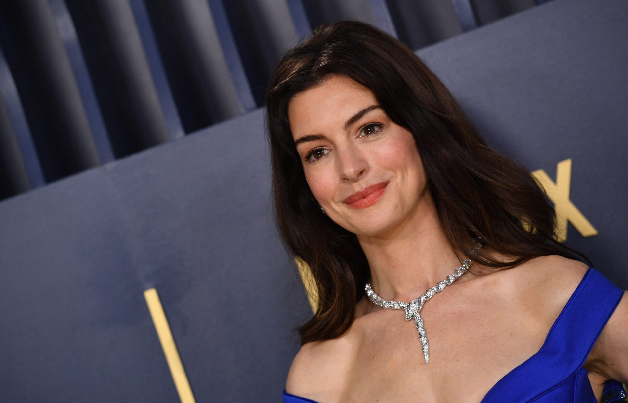 Anne Hathaway Stuns in Cerulean Blue Dress as She Reunites with Devil ...
